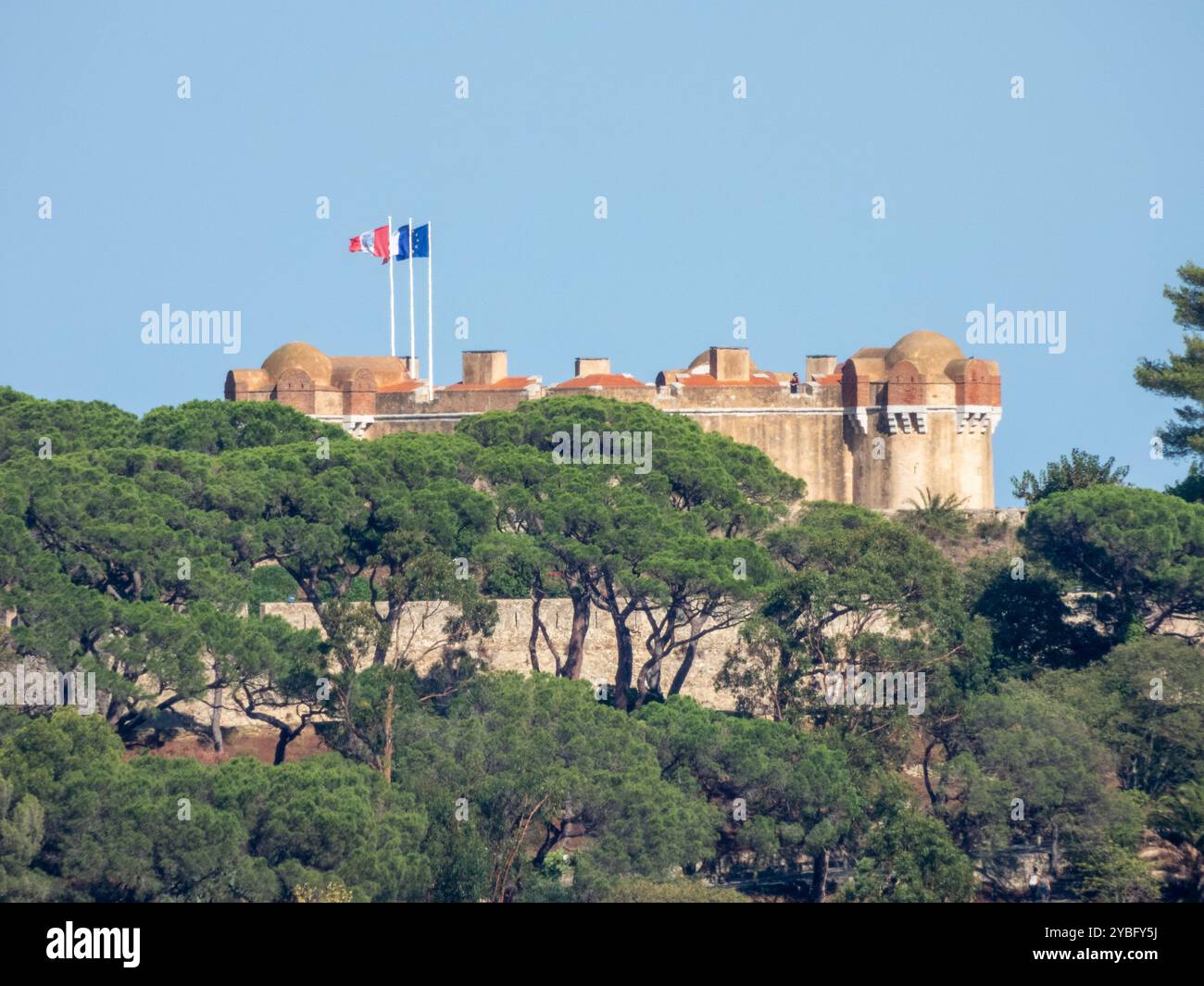 Saint-Tropez citadel Castle at the top of a hill with pines, in France ...