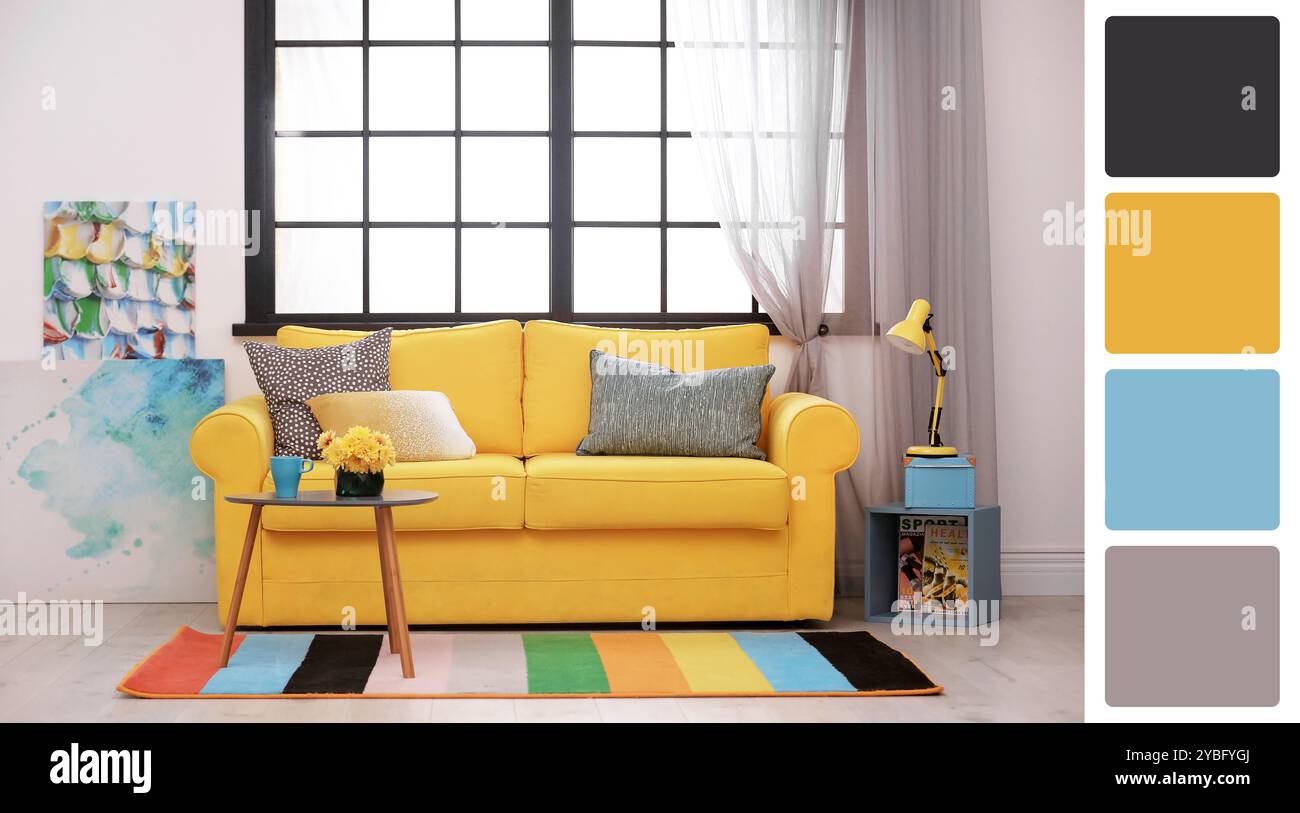 Stylish living room with comfortable sofa near window. Interior design ...