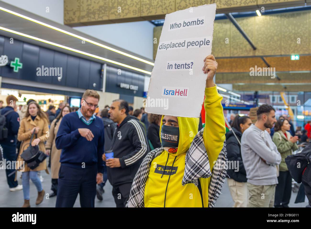 Leeds, UK. 18 OCT, 2024. Protestors occupy Leeds train station as they ...
