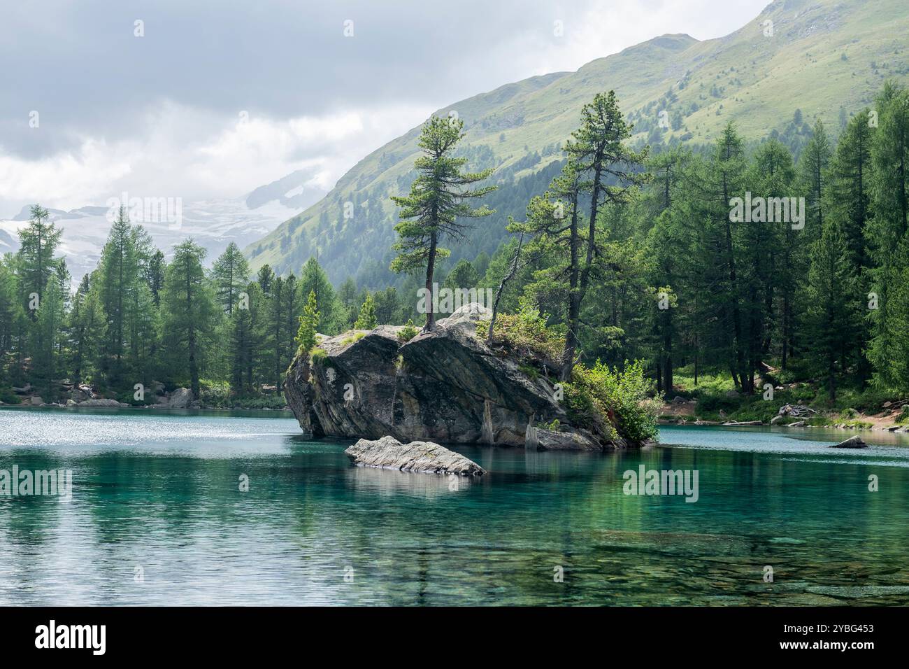Scenic Alpine View of Lake Saoseo with Reflections and Rugged Mountain ...