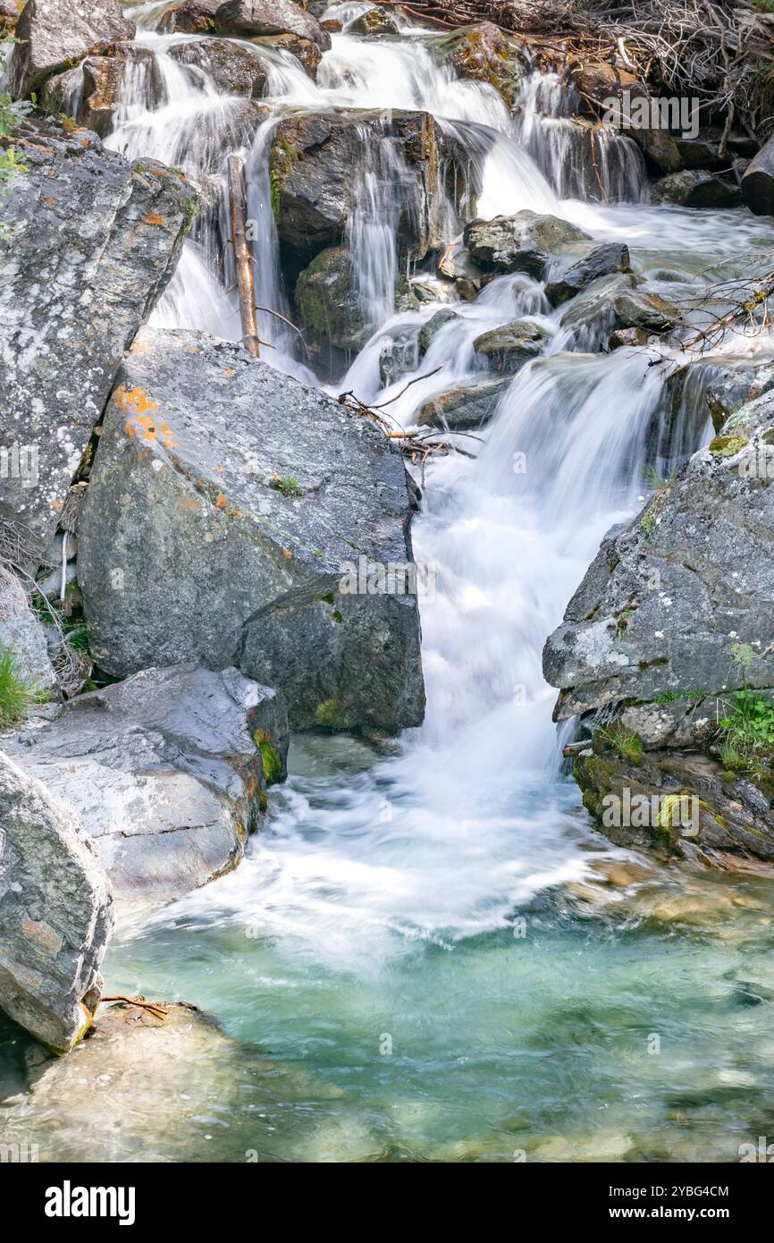 Waterfall between rocks rugged mountain hi-res stock photography and ...