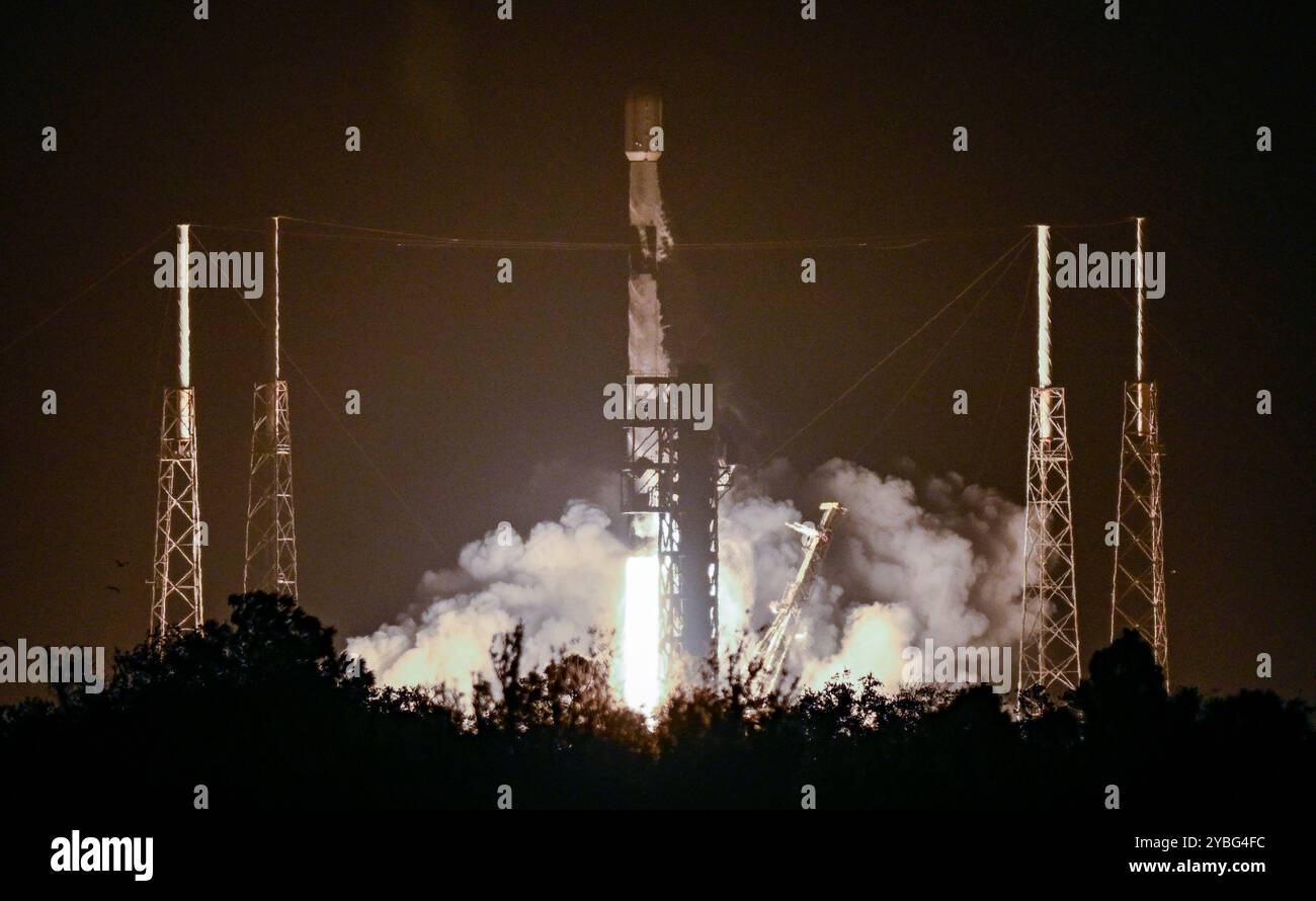 A SpaceX Falcon 9 rocket launches a payload of Starlink satellites from ...