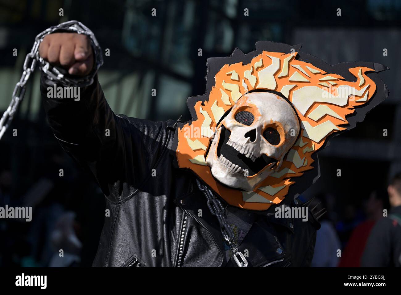 A man dressed as the character Johnny Blaze from 'Ghost Rider' wears a ...