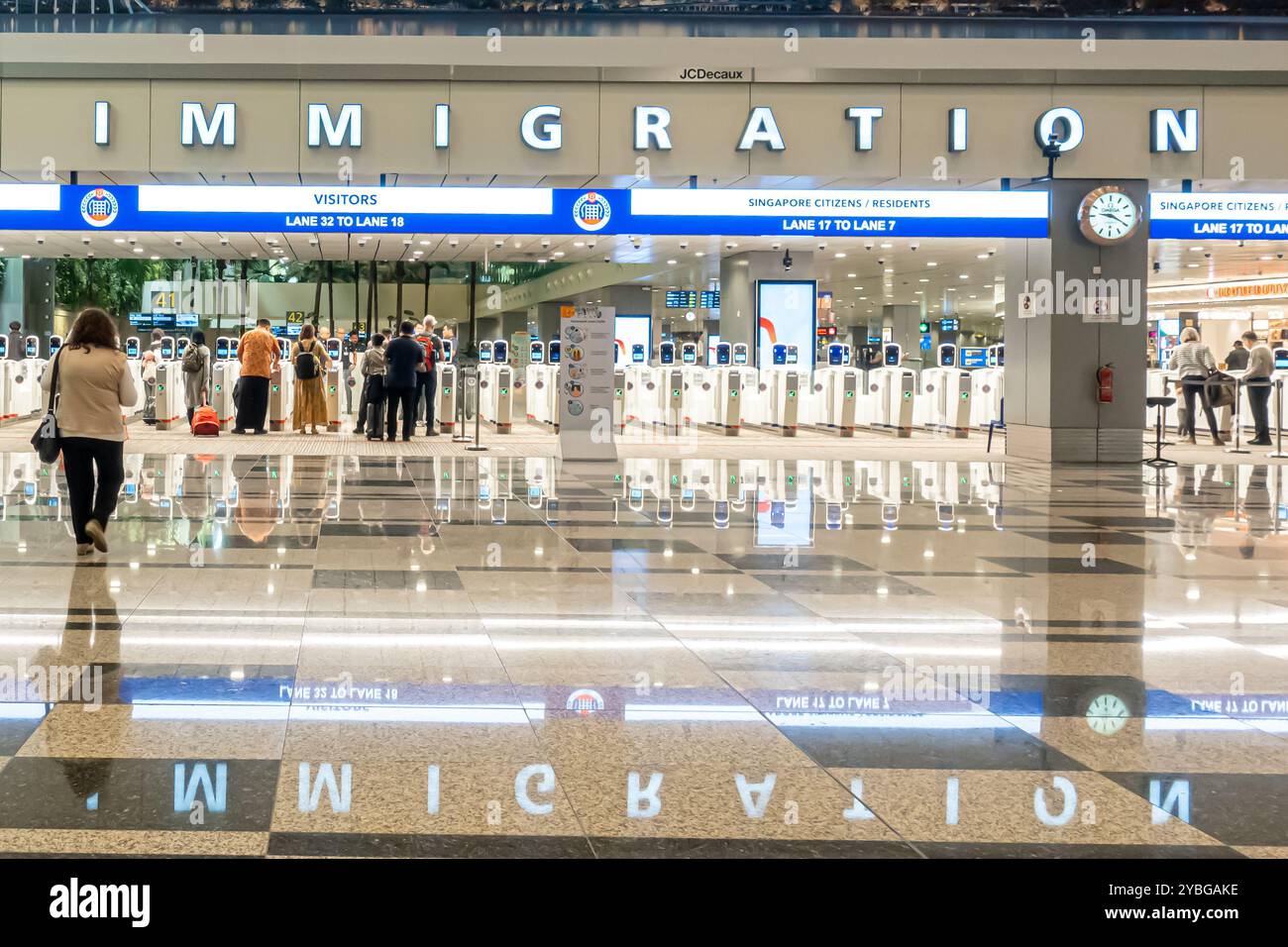 Immigration gates at Singapore Airport Terminal 3 Stock Photo - Alamy