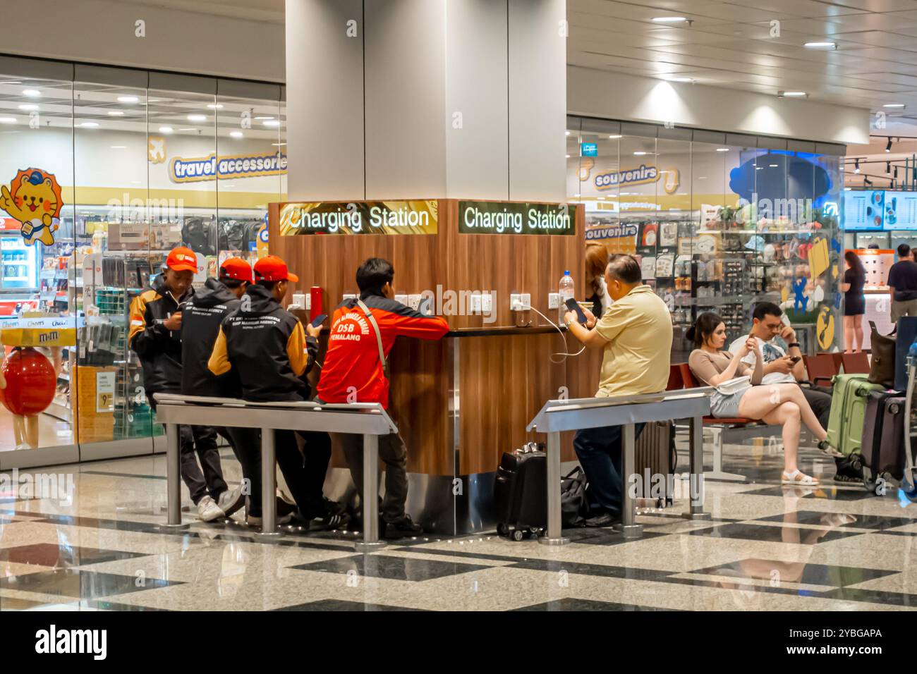 Singapore airport Mobile phones charging station with electric outlet ...