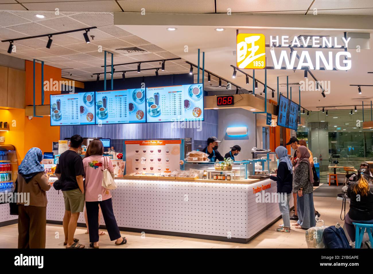 Heavenly Wang offers a halal range of food & beverage - cafe in Singapore airport Stock Photo ...