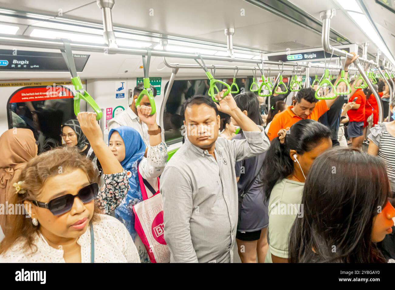 Multi-racial people, passengers on a train, people train subway ...