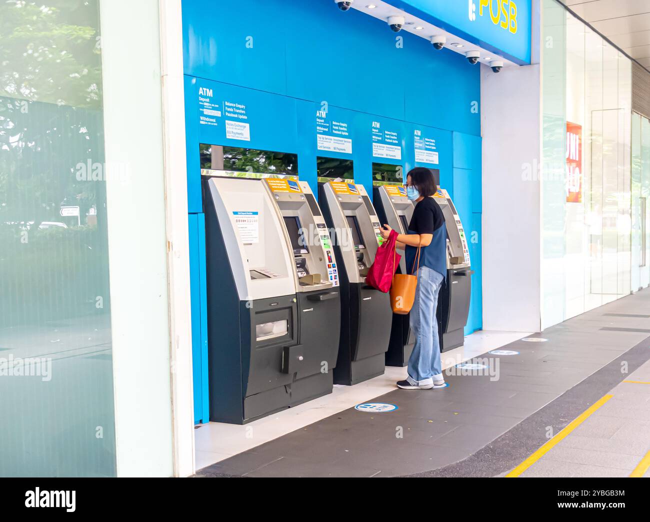 Women using POSB ATM, Singapore.Tiong Bahru Plaza Stock Photo - Alamy