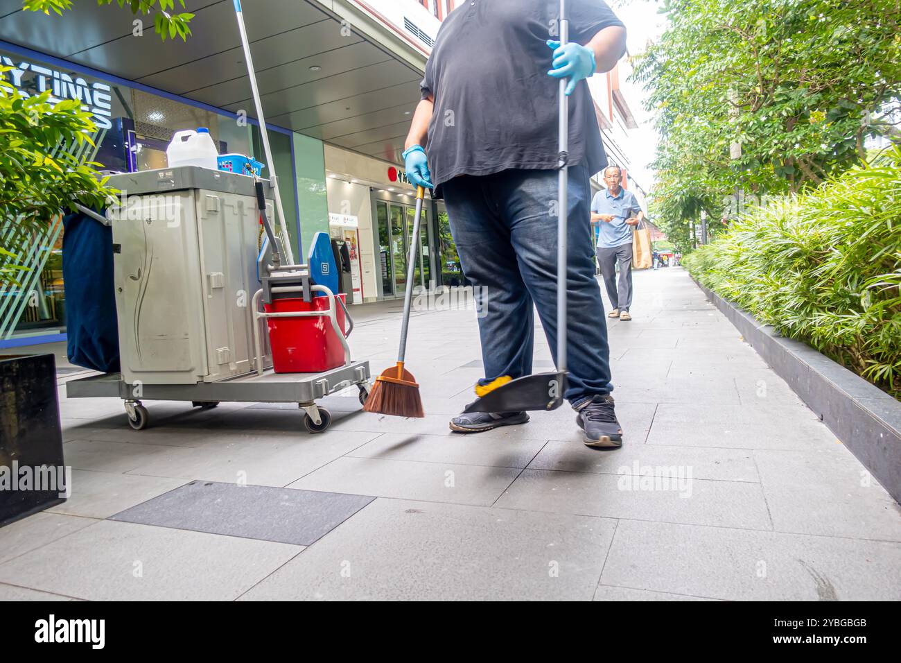 Young street sweeper hi-res stock photography and images - Alamy