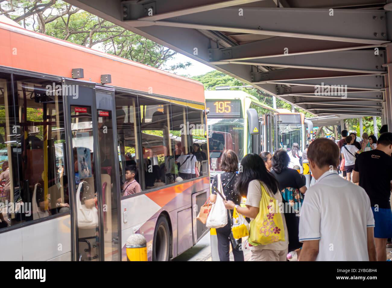 Passengers boarding city bus, Tiong Bahru district Singapore Stock ...