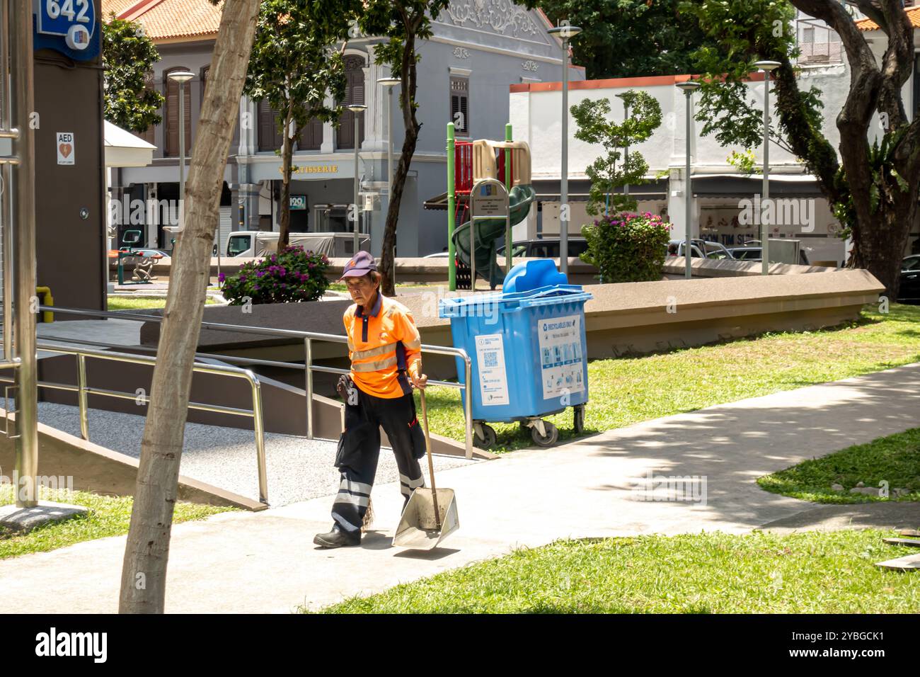 Street sweeper, janitor, cleaner, trash bin. Little India, Singapore ...