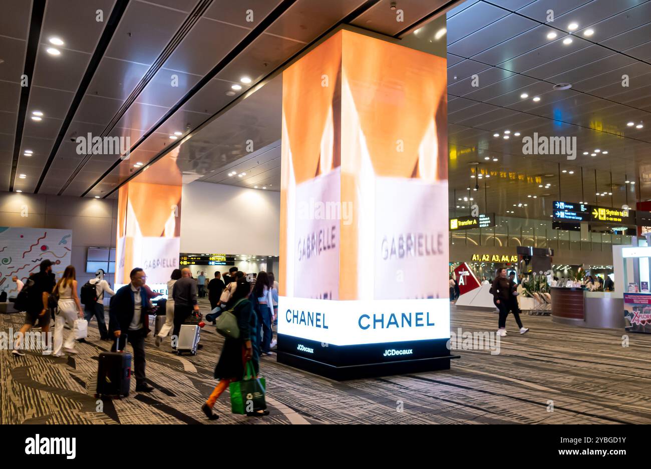 Gabrielle Chanel perfume ad screen panel in Singapore Airport Stock ...
