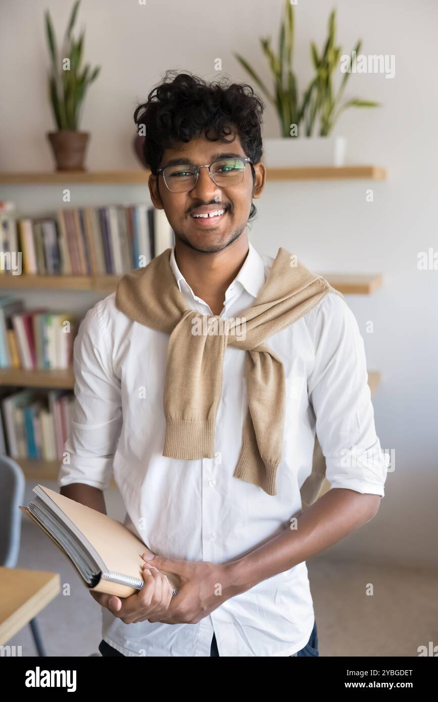 Cheerful indian male tutor hi-res stock photography and images - Alamy