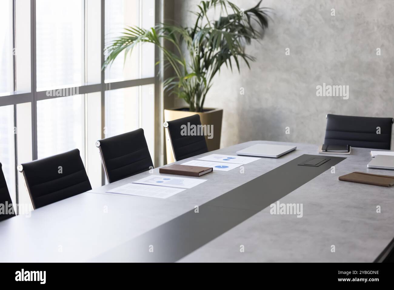 Modern business meeting room with large table, empty chairs Stock Photo ...