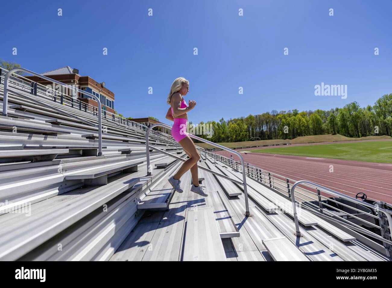 Blonde athlete energizes, running bleachers prepping for local meet ...