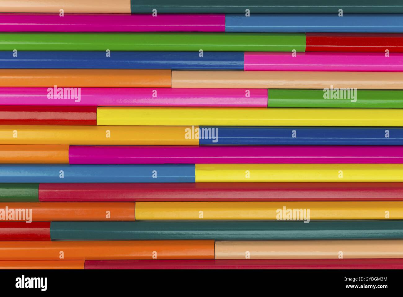 Collection of coloured pencils in a horizontal line pattern as ...