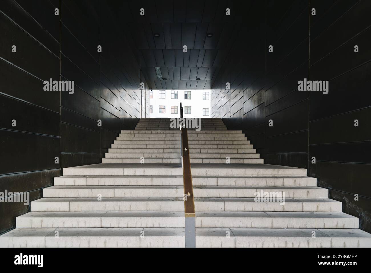 Frontal view of modern staircase in passageway Stock Photo - Alamy