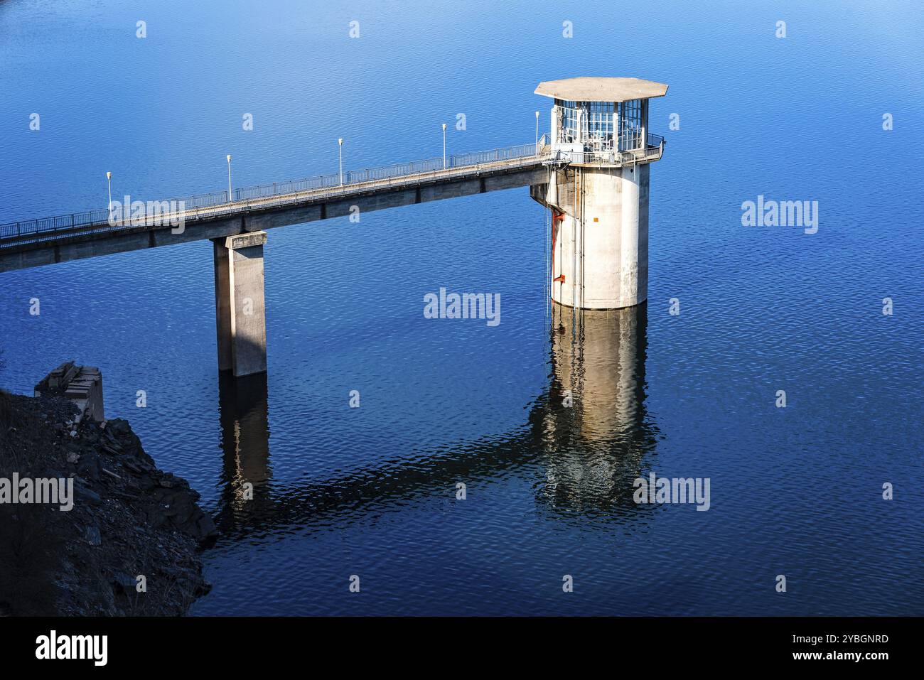 The Atazar reservoir and control tower of Dam in the mountain range of ...