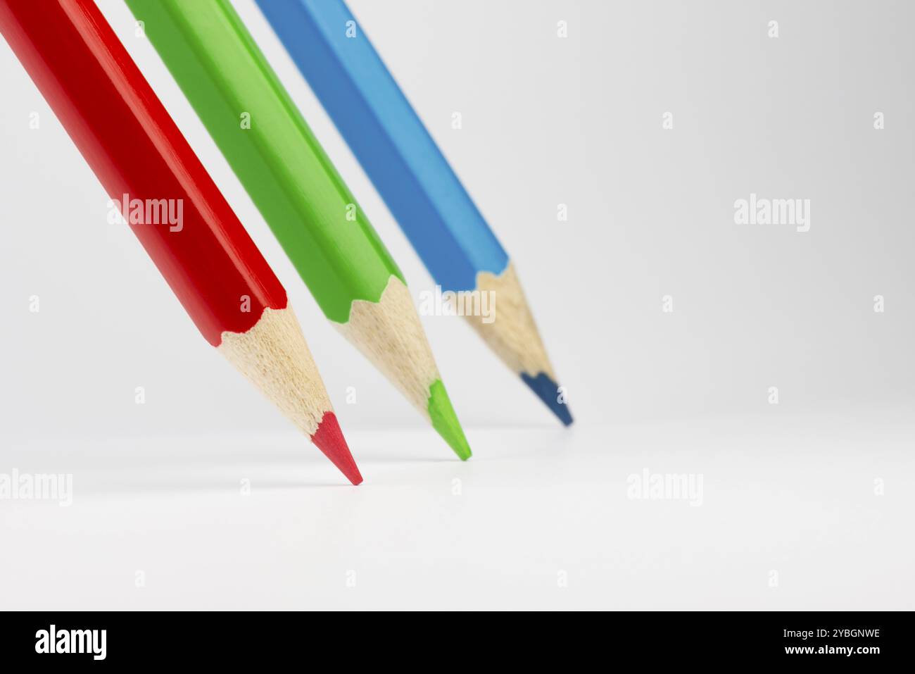 Three standing colored pencils in RGB colors Stock Photo - Alamy