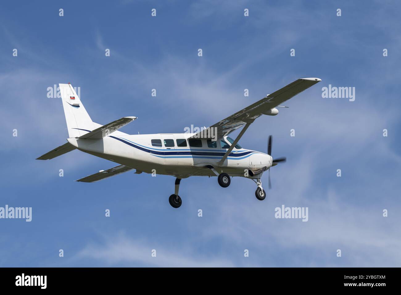 Single-engined propeller business plane during take off at a small ...