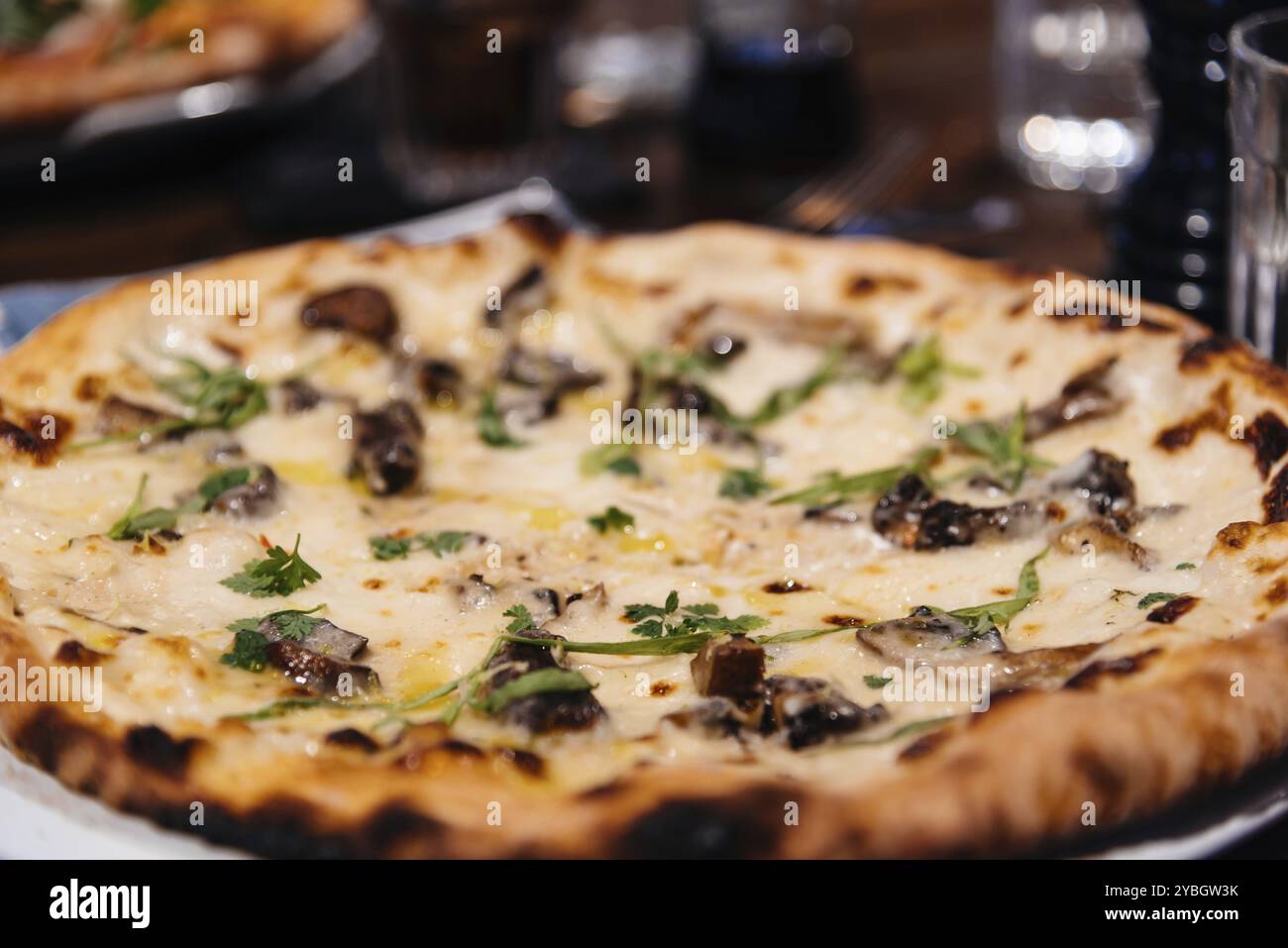 Delicious classic italian Pizza in pizzeria restaurant Stock Photo - Alamy