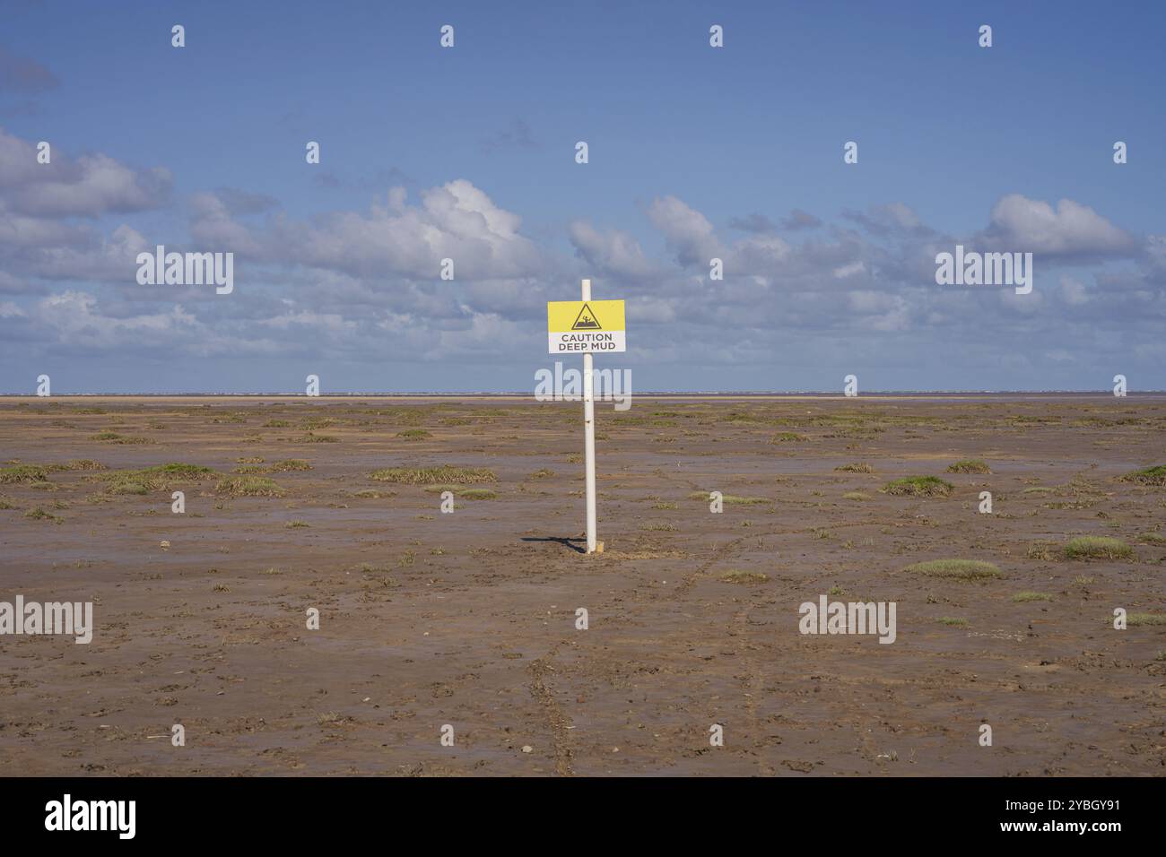Sign: Caution, deep mud, seen in Southport, Merseyside, England, UK ...