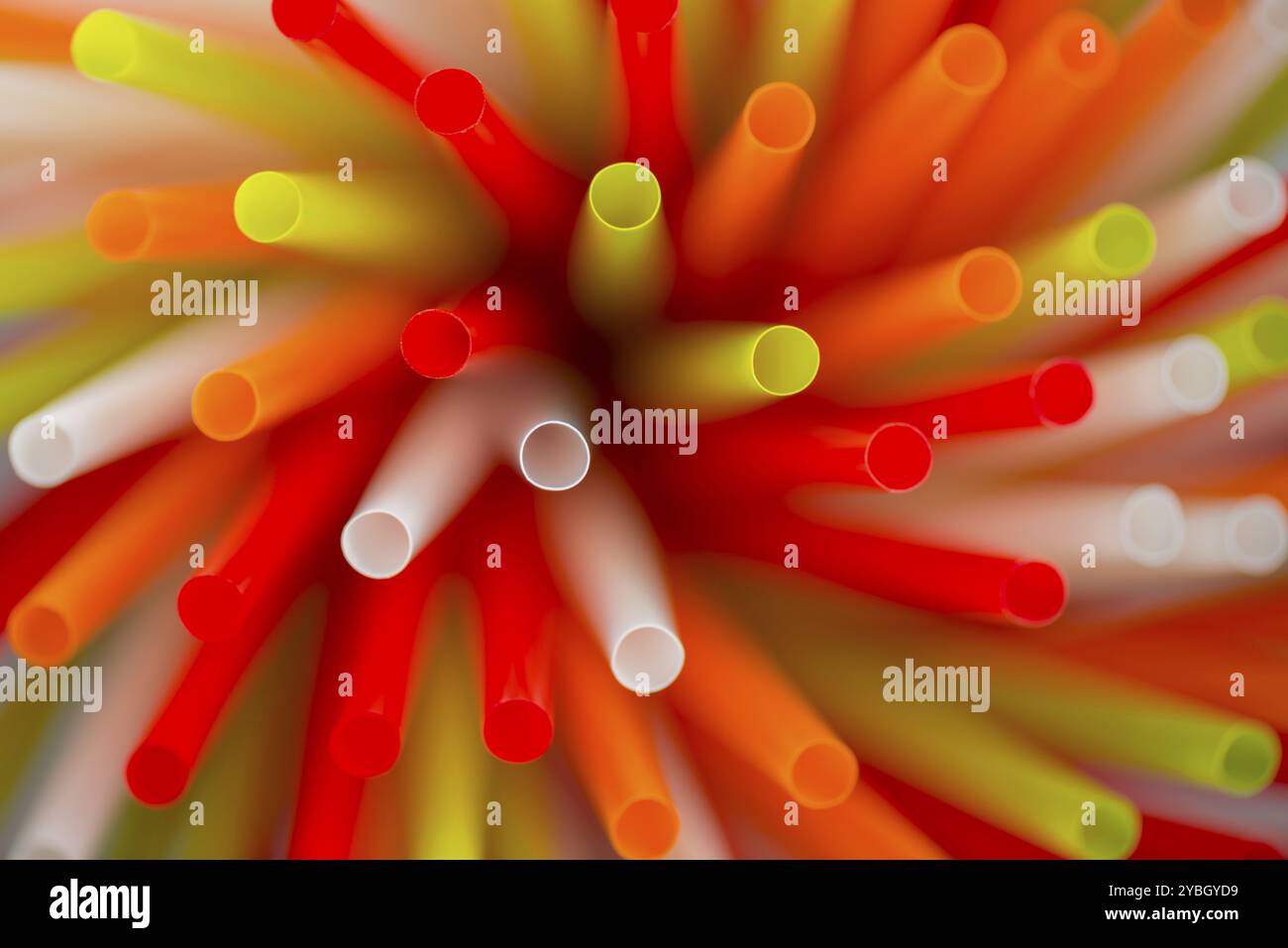 Collection colored drinking straws in blur Stock Photo - Alamy