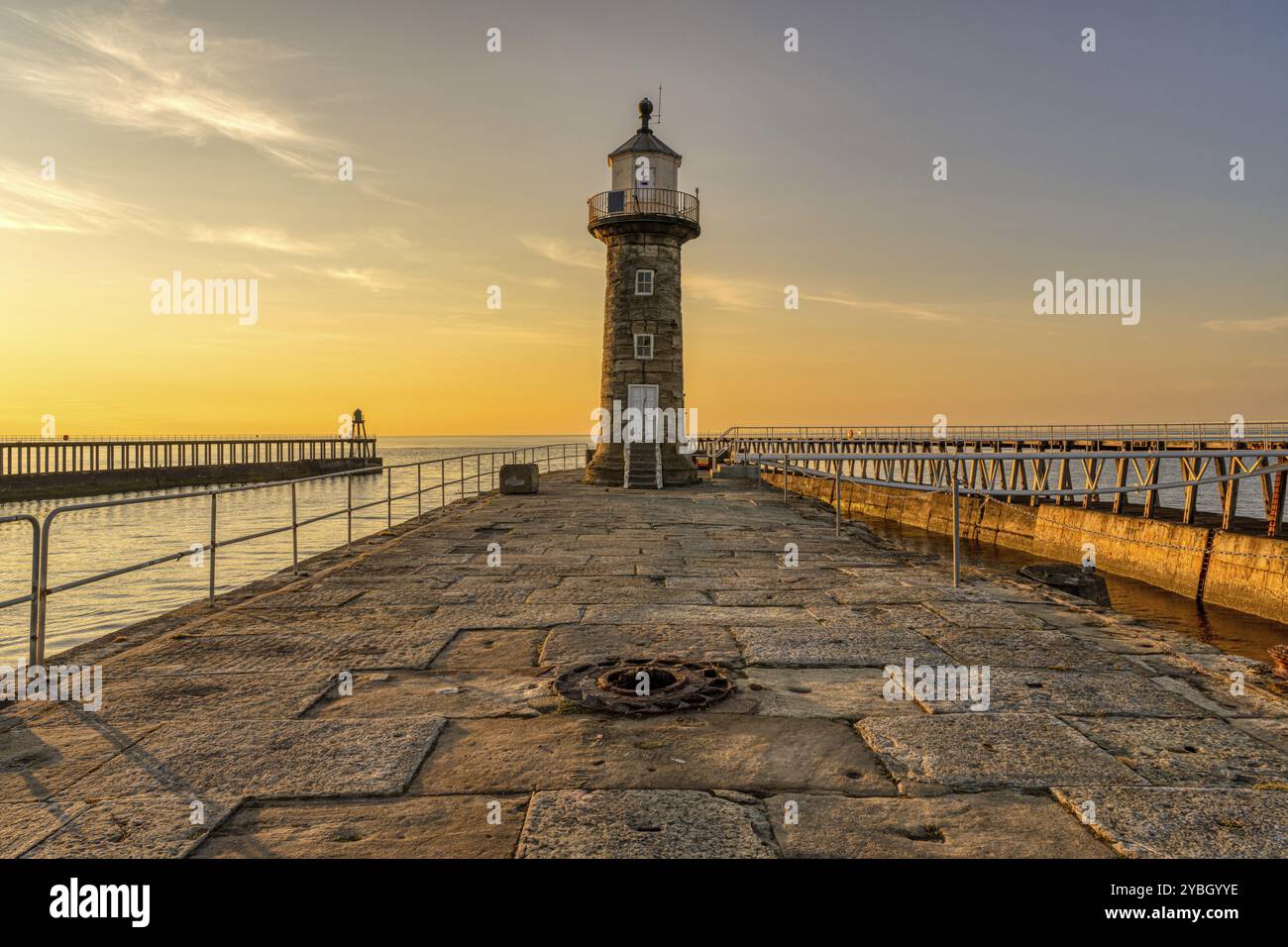 Golden Hour at the East Pier and Whitby East Harbour Lighthouse in ...
