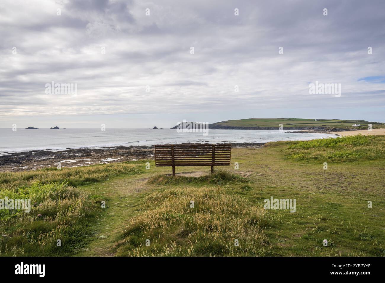 An old rusty bench in Treyarnon Bay, Cornwall, England, UK Stock Photo ...
