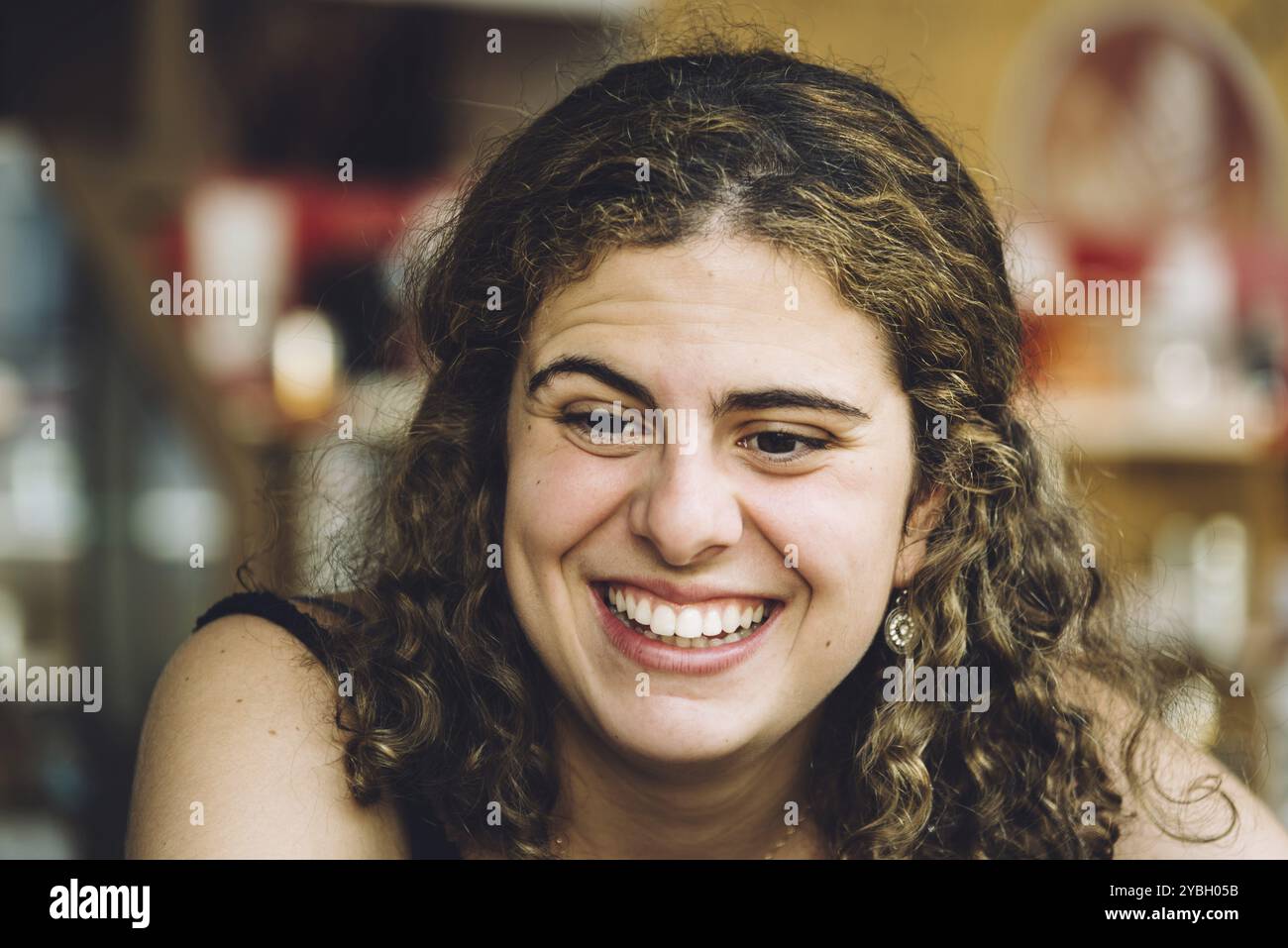 Happy girl laughing against blur background. Concept of joy Stock Photo ...