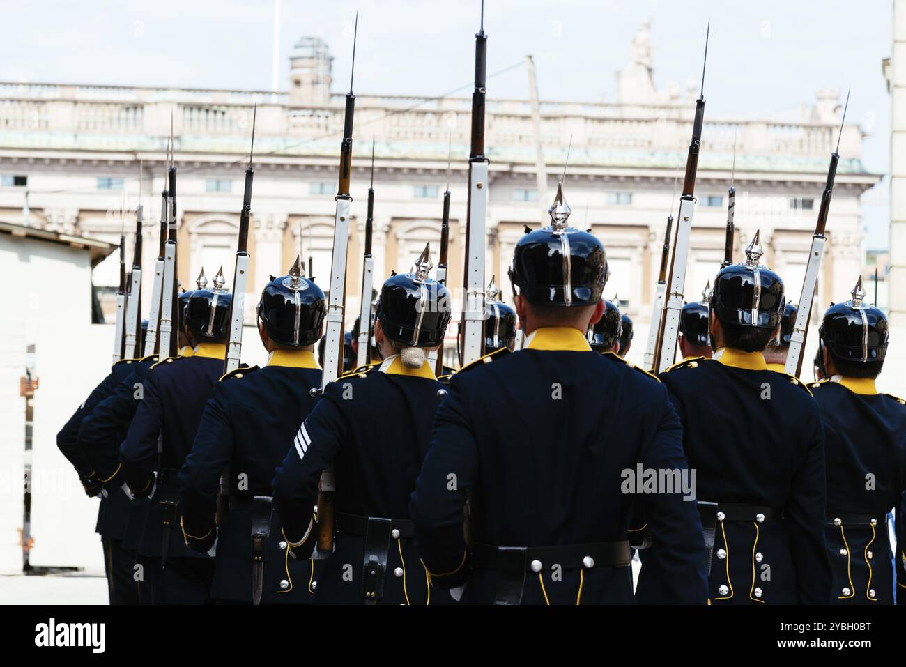 Unidentified soldiers marching with old helmets and bayonets in a ...