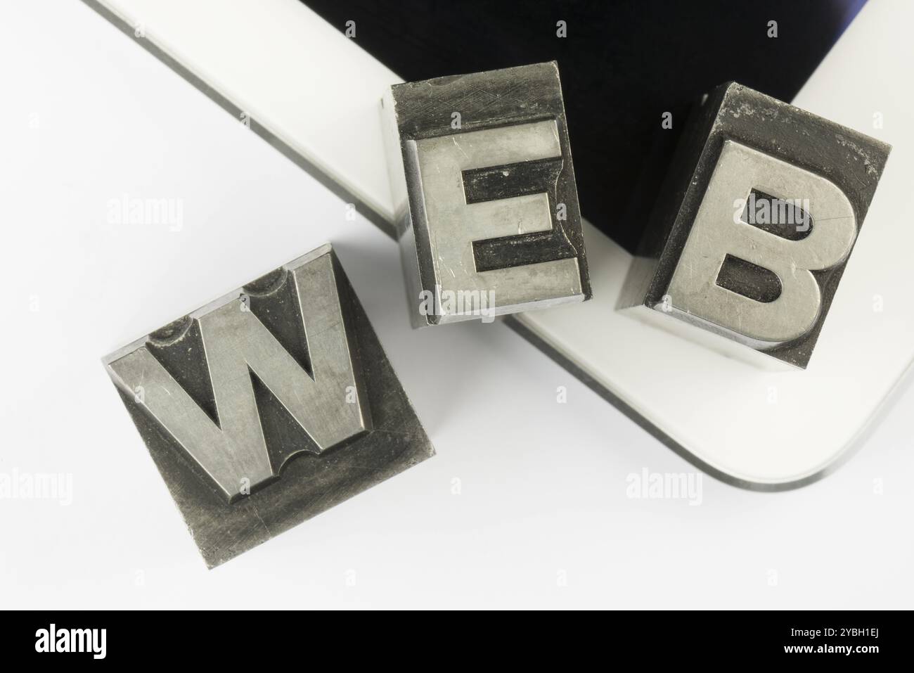 Old lead ink printing type letters from a book printing company, as a ...