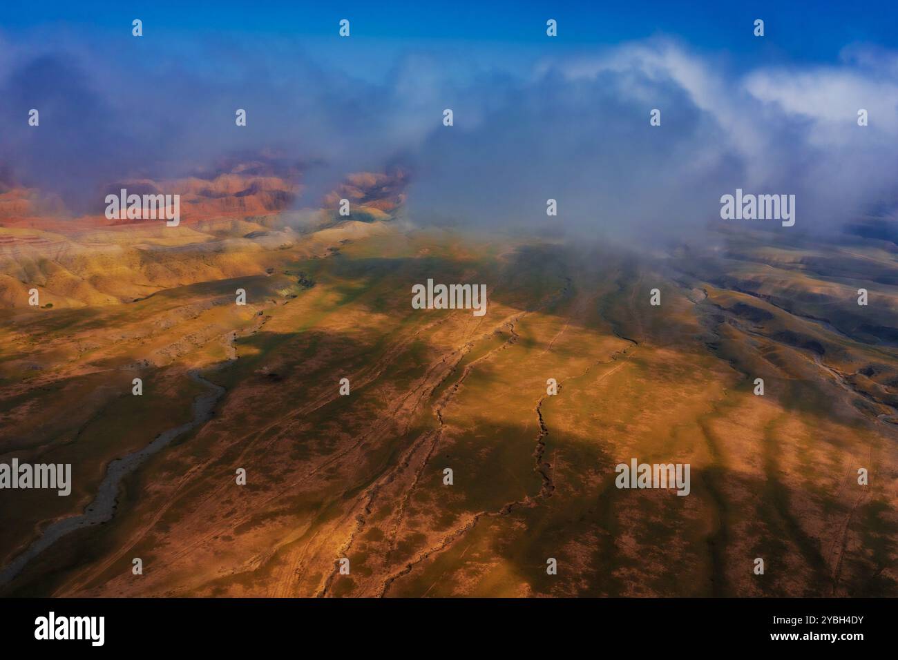 TACHENG, CHINA - OCTOBER 18, 2024 - Clouds swirl around the Ustu ranch ...