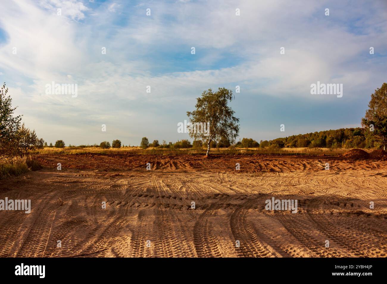 Cleared and bulldozed area in a field for construction Stock Photo - Alamy