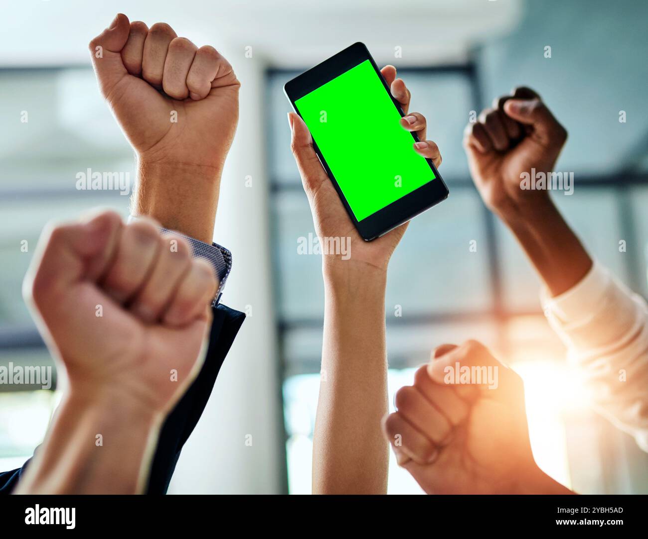 Hands of business people cheering and celebrate good news on a phone ...