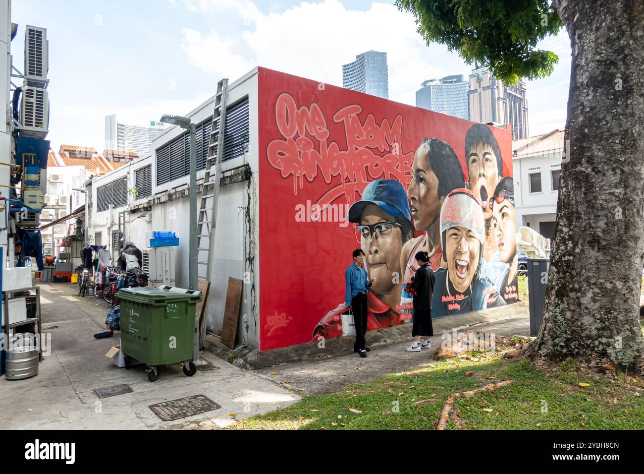 One team Singapore mural depicting young sportsmen Stock Photo - Alamy