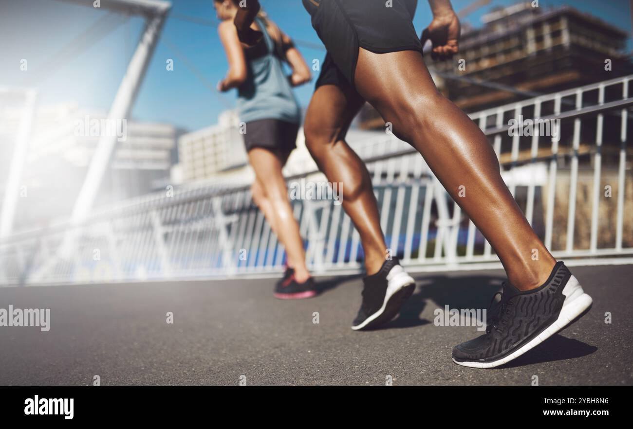 Fitness, people and legs with running in city outdoor for marathon ...