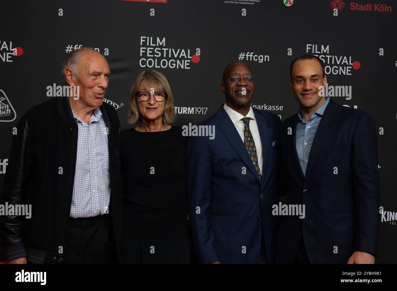 Edwin Moses, a former American hurdler, Anne Merrem, Julian Moses, and ...