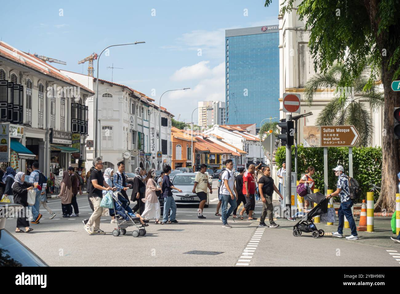 People crossing road, Cross of North Bridge Rd & Arab street, Singapore ...