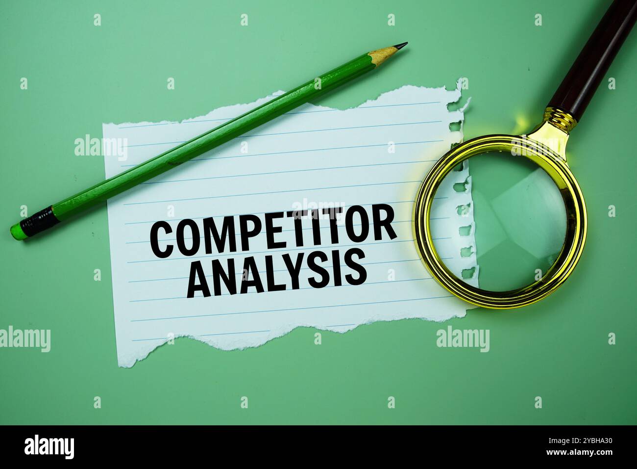 Competitor Analysis quotes text on paper torn with magnifying glass top ...