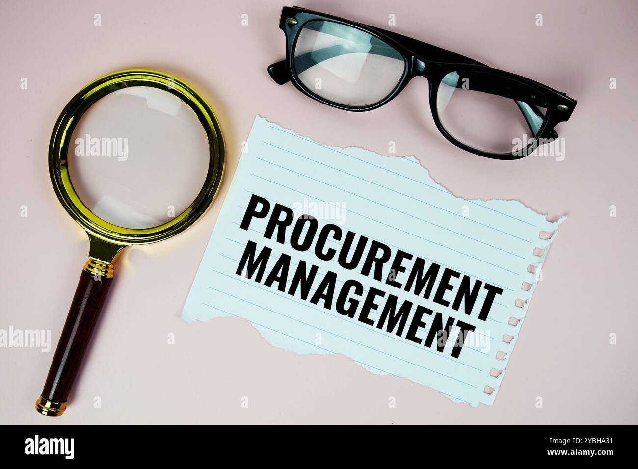 Procurement Management with magnifying glass top view on pink ...
