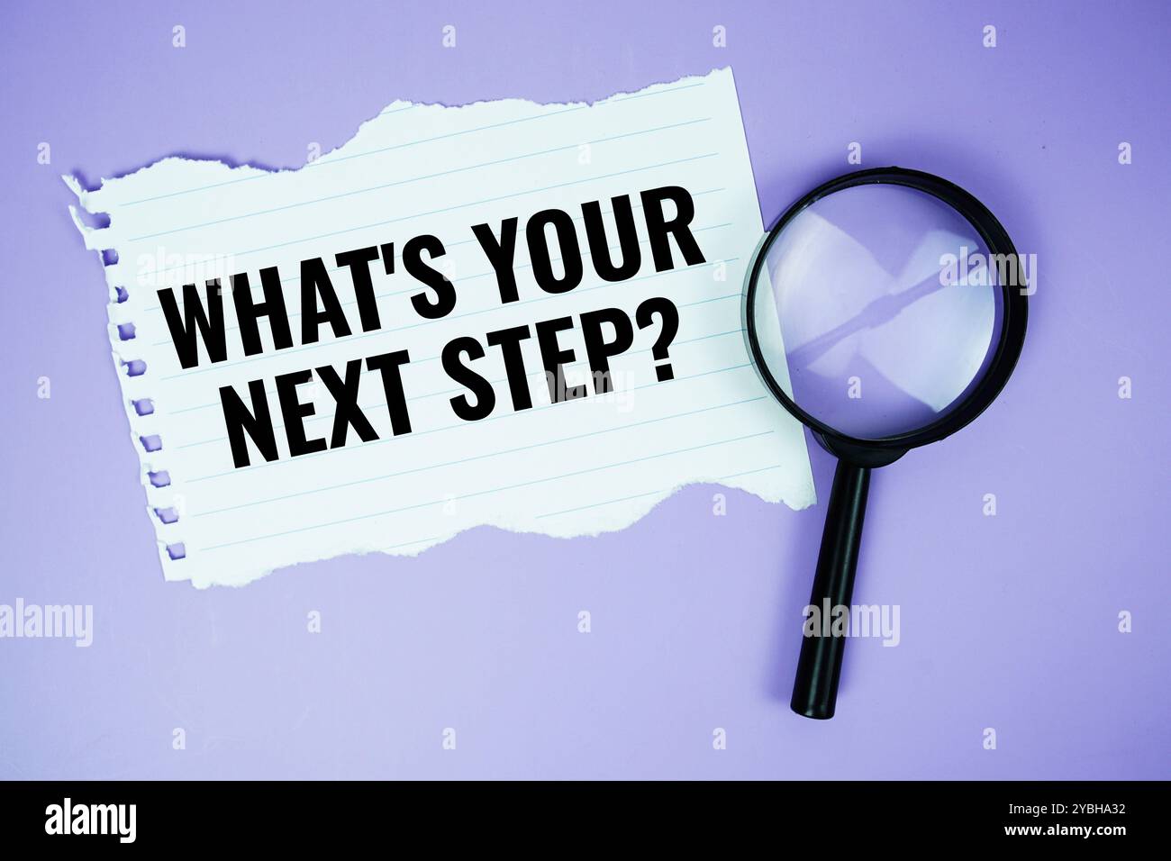 What's your next step? text written on paper torn top view on purple ...