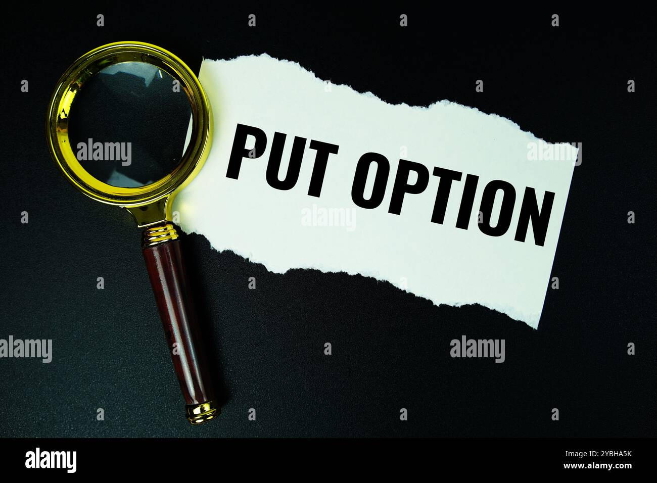 Put Option text with magnifying glass top view on pink background Stock ...