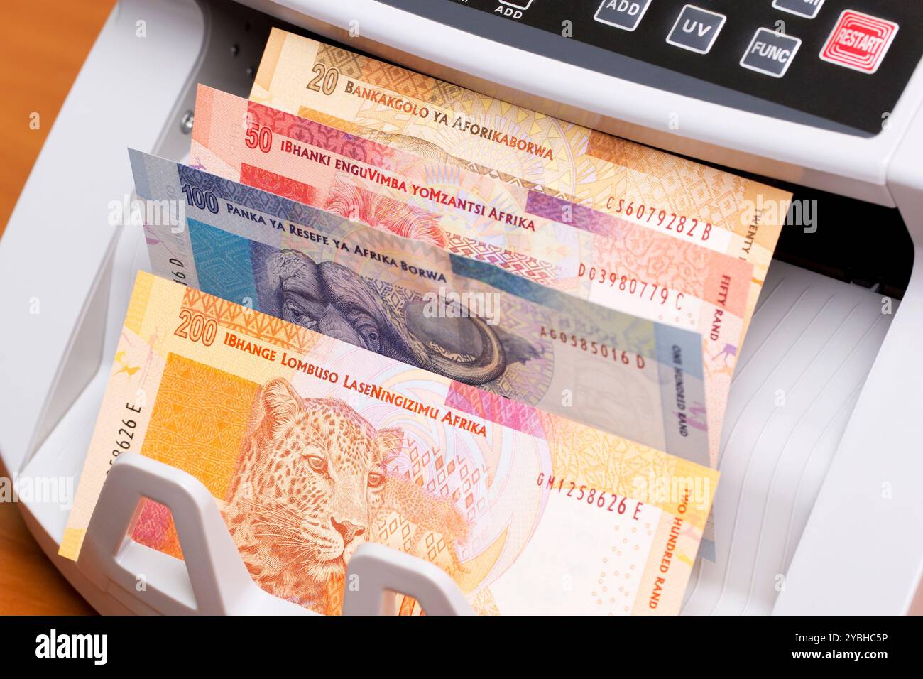 South African money - rand in the counting machine Stock Photo - Alamy