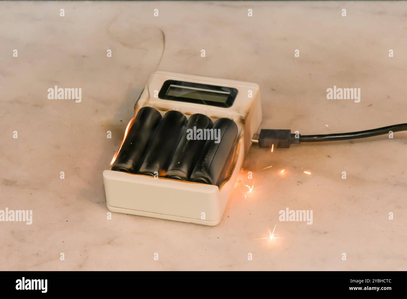 Battery charger unit is on fire, wiring is sparking. Short circuit ...