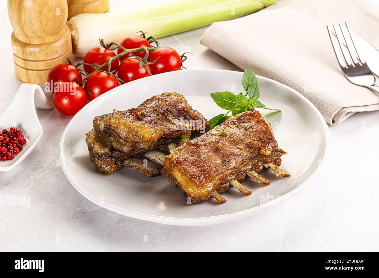 Roasted Lamb ribs with spices and herbs Stock Photo - Alamy