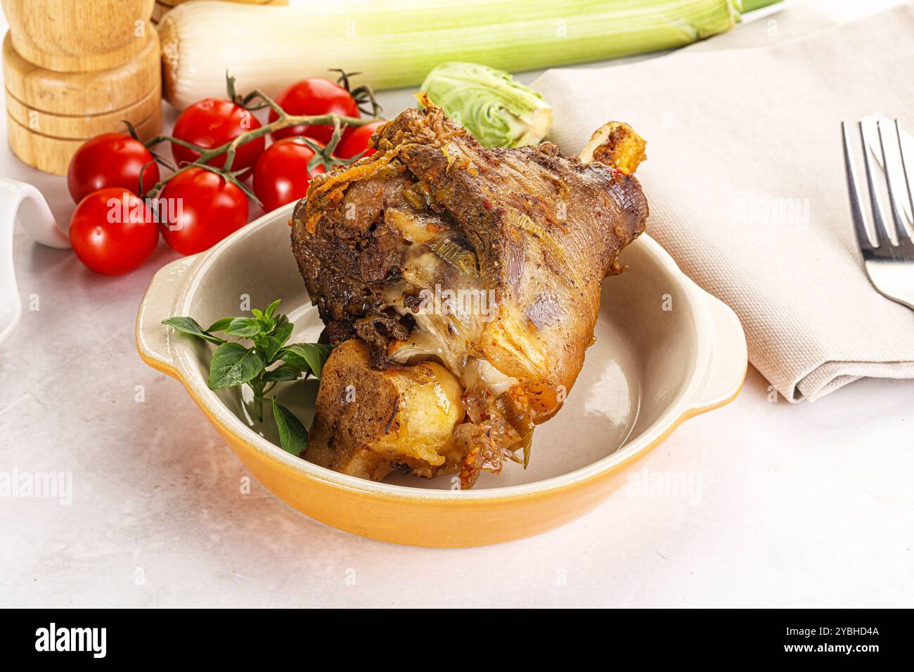 Baked Lamb shank with bone marinated in spices Stock Photo - Alamy