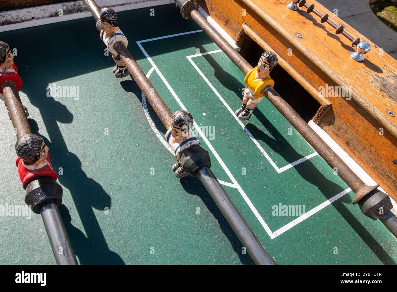 close-up view of the table football game of football figures on the ...