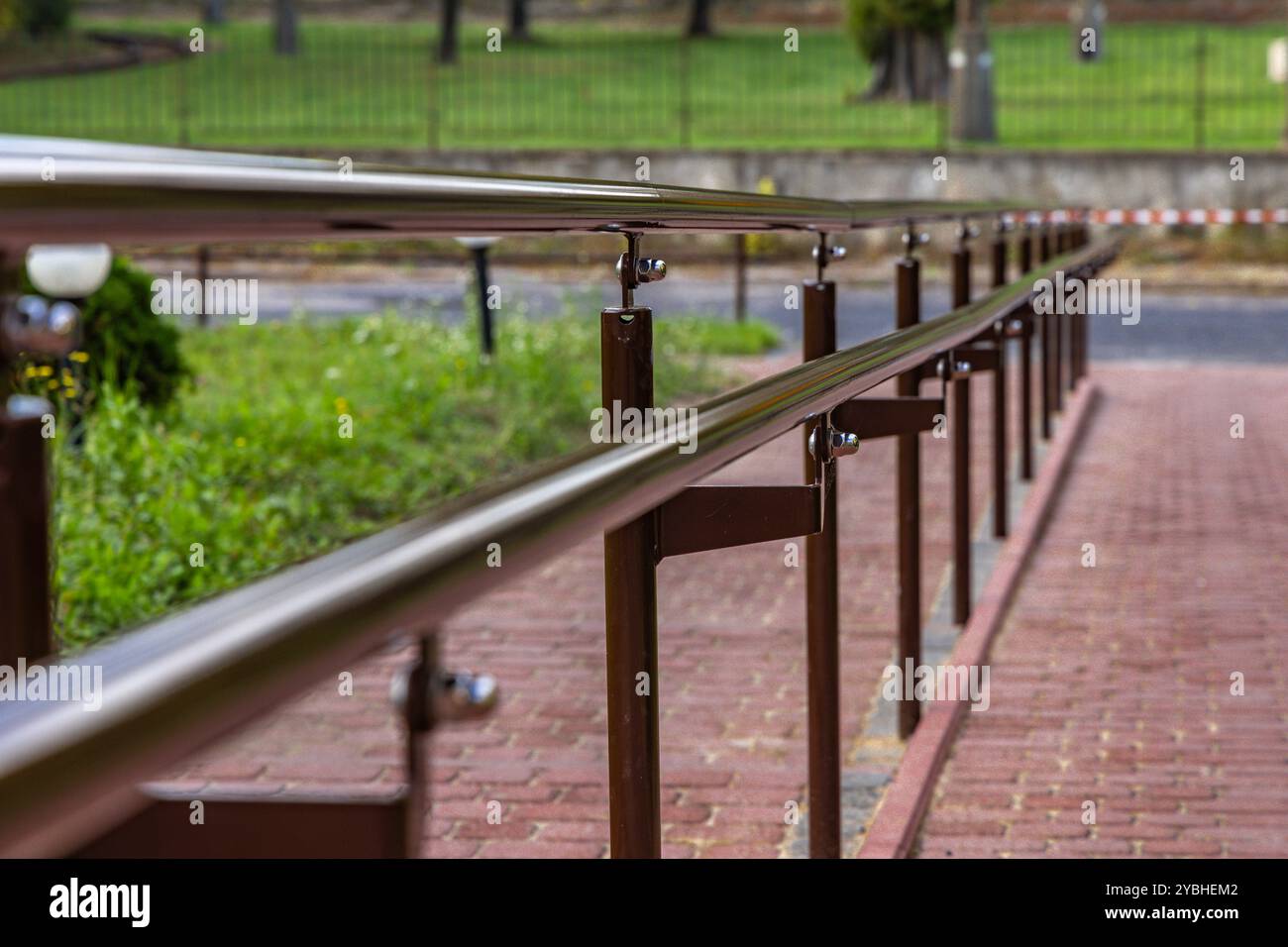 Ramp for wheelchair users, protective handrails on the ramp for people ...