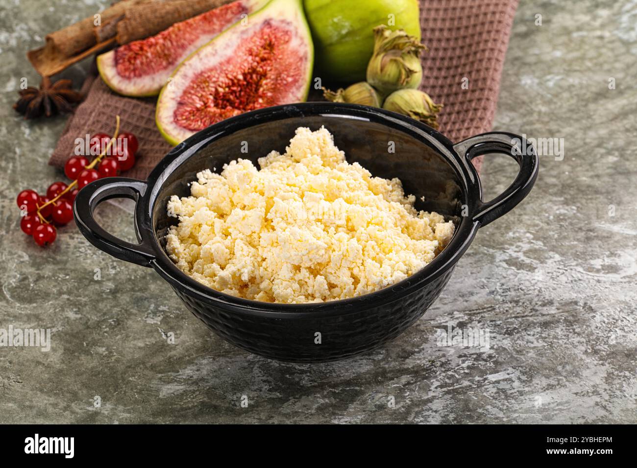Delicous sheep cottage cheese curd served fig Stock Photo - Alamy